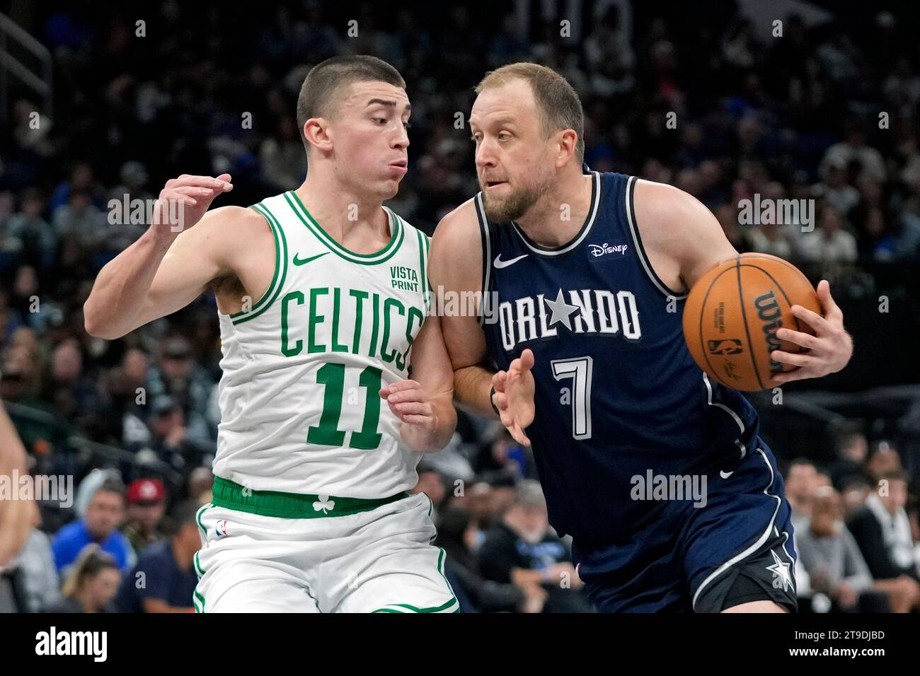 Orlando Magic guard Joe Ingles (7) drives past Boston Celtics guard ...