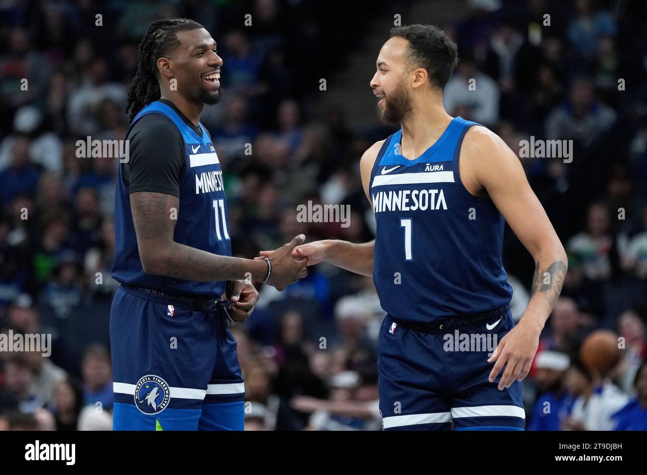 Minnesota Timberwolves center Naz Reid (11) and forward Kyle Anderson ...