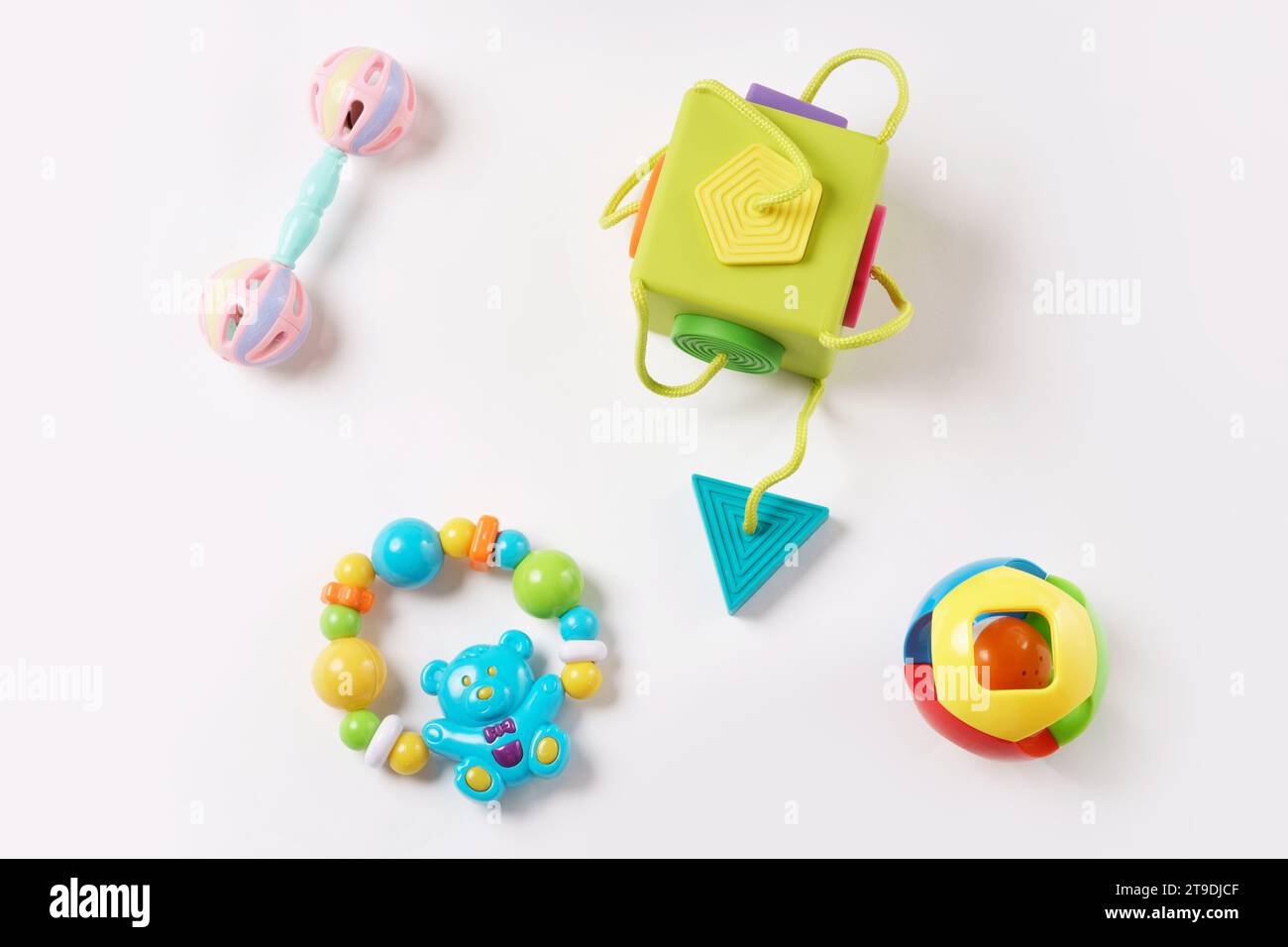Closeup shot of a collection of colorful plastic toys and puzzles fot ...