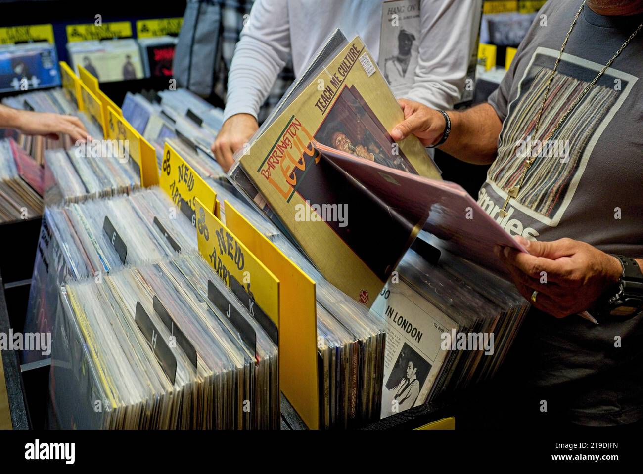 Ft. Lauderdale, Florida, USA. 24th Nov, 2023. LEEROY LEON (R) browses records in the new ...