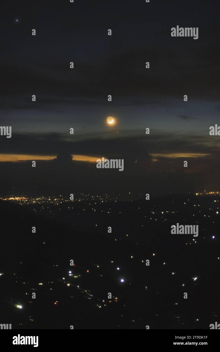 The ashen moon falls after sunset Stock Photo - Alamy