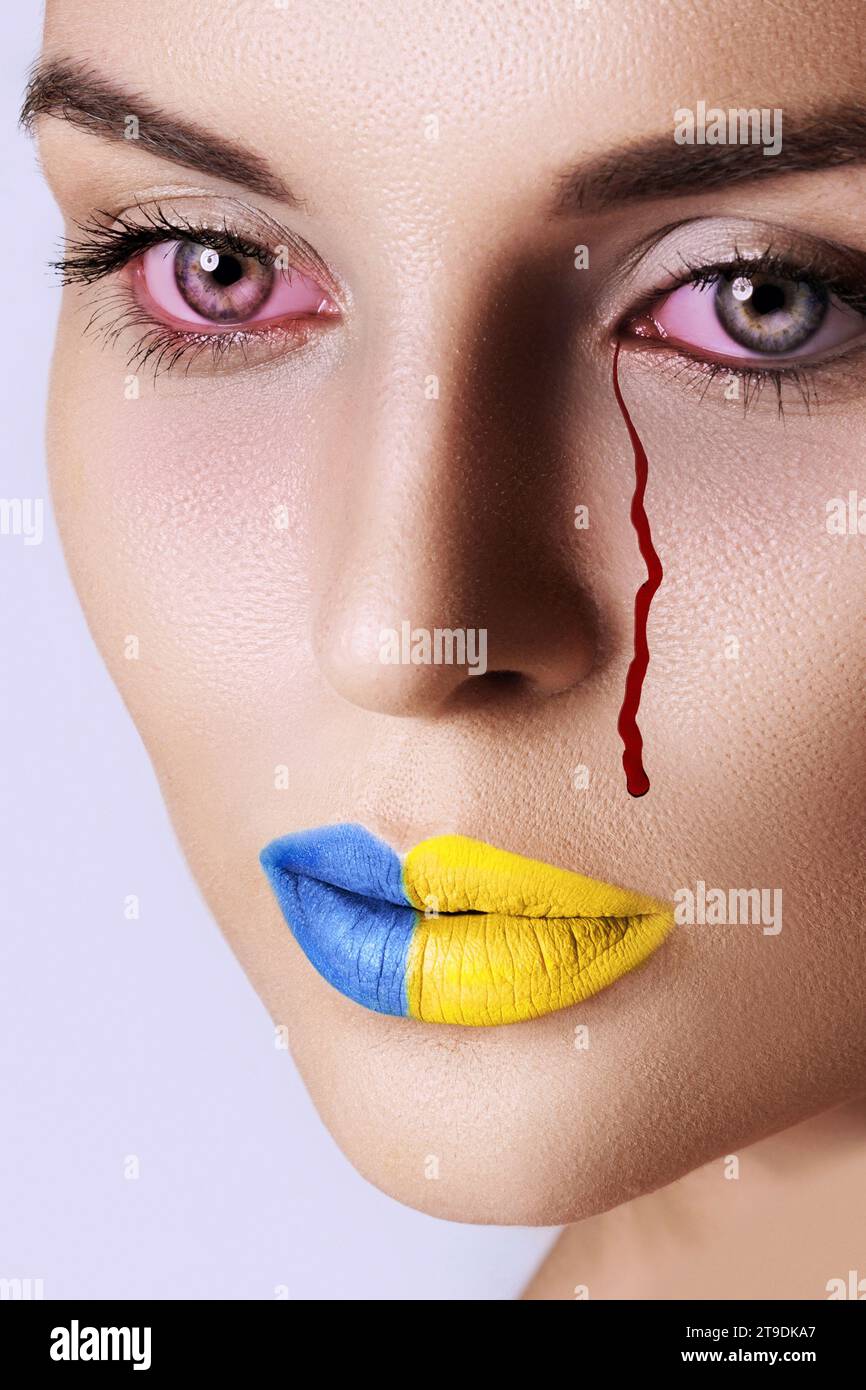 Conceptual photo of crying Ukrainian woman with a bloody tears Stock ...