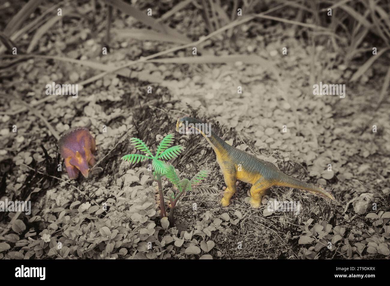 infrared image of the dinosaur toys the bushy grassland Stock Photo - Alamy