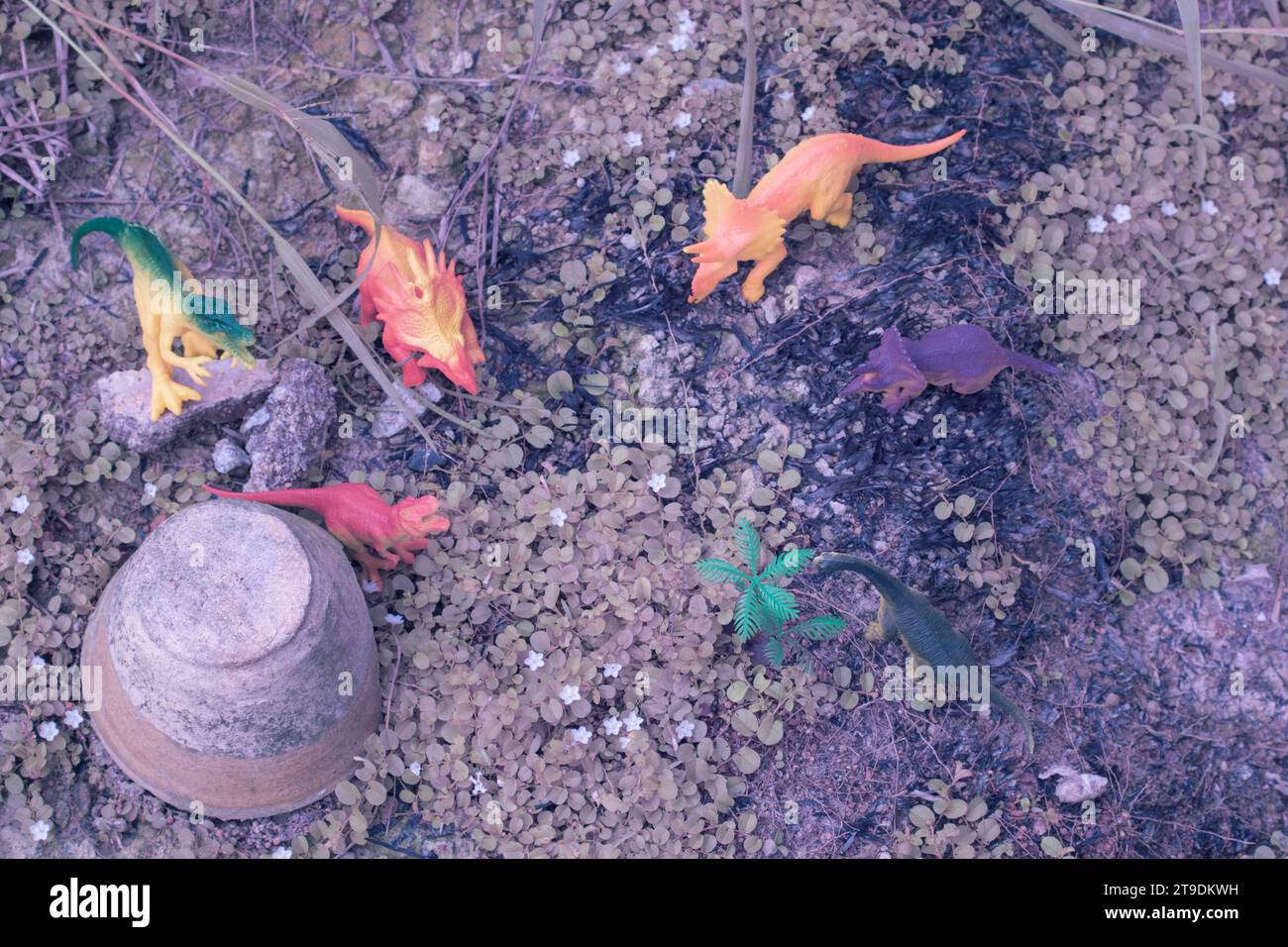 infrared image of the dinosaur toys the bushy grassland Stock Photo - Alamy