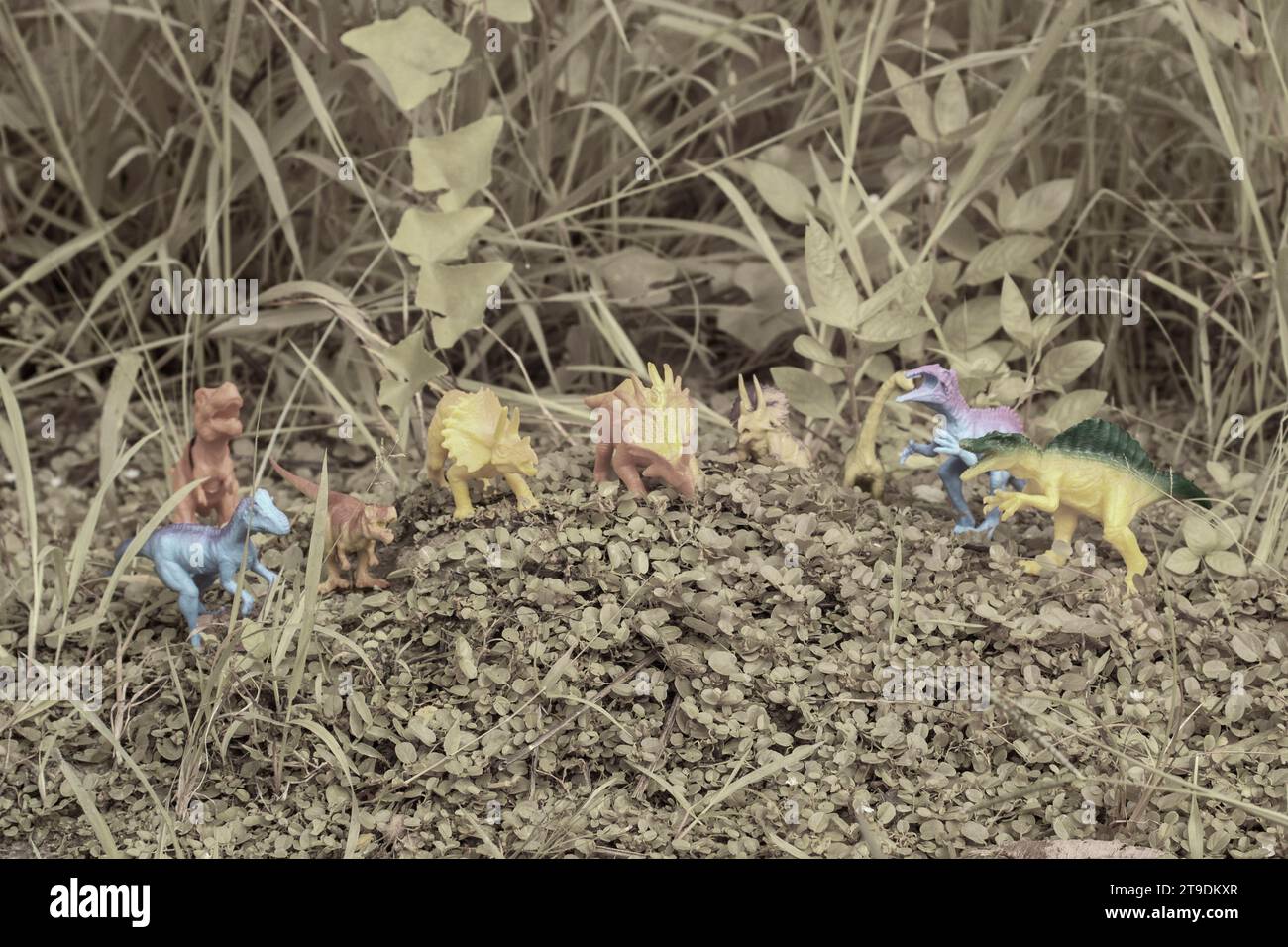 infrared image of the dinosaur toys the bushy grassland Stock Photo - Alamy