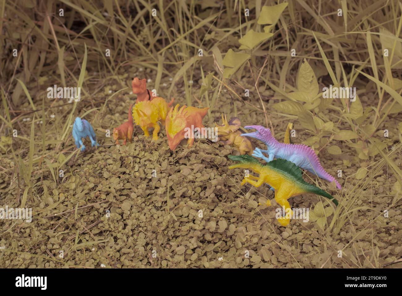 infrared image of the dinosaur toys the bushy grassland Stock Photo - Alamy