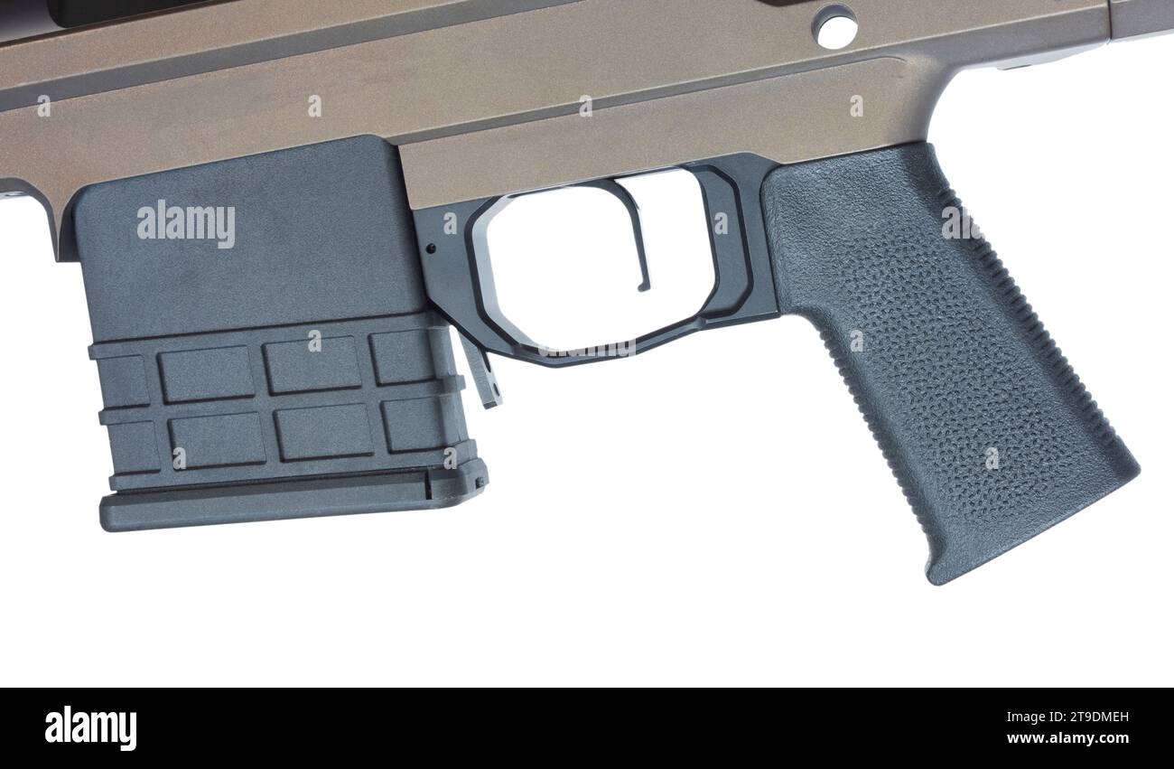 Isolated trigger, magazine and pistol grip on a modern rifle that has a ...