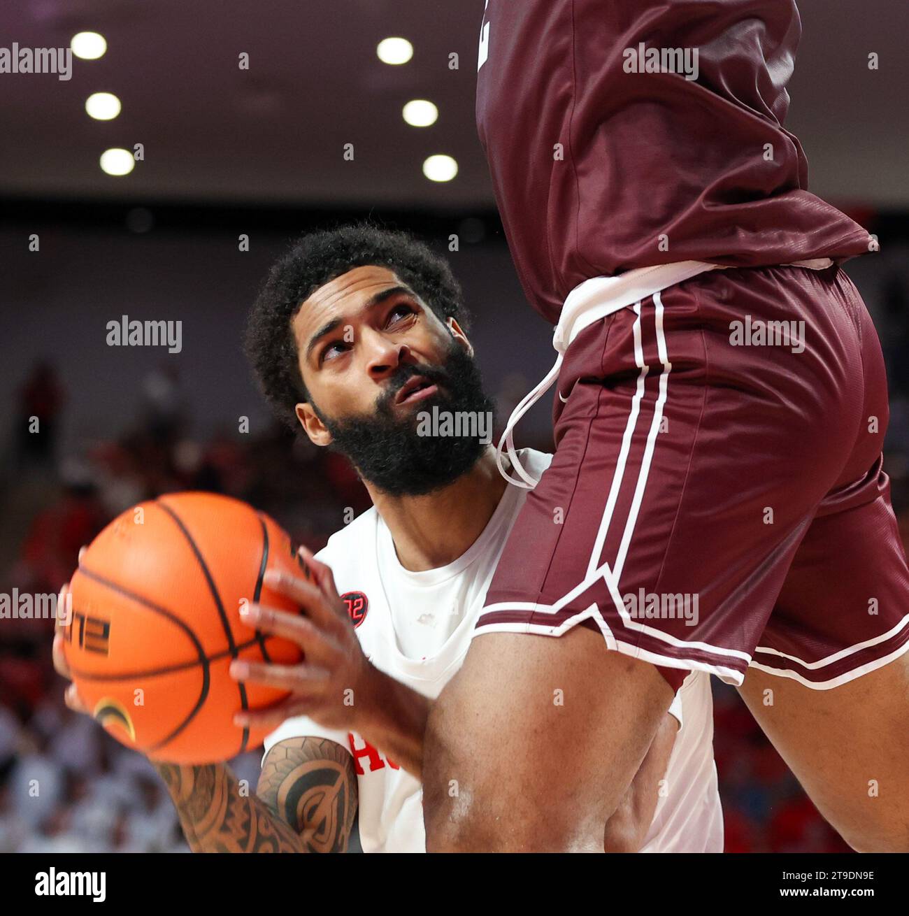 November 24, 2023: Houston Cougars guard Damian Dunn (11) works against ...