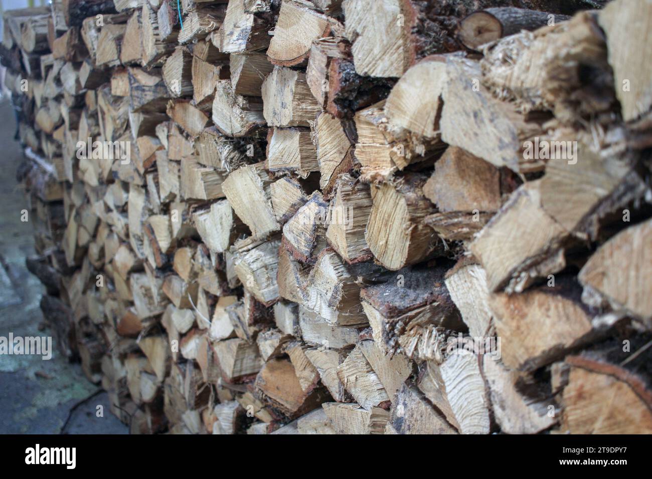 wood piled at home for a hard winter Stock Photo - Alamy