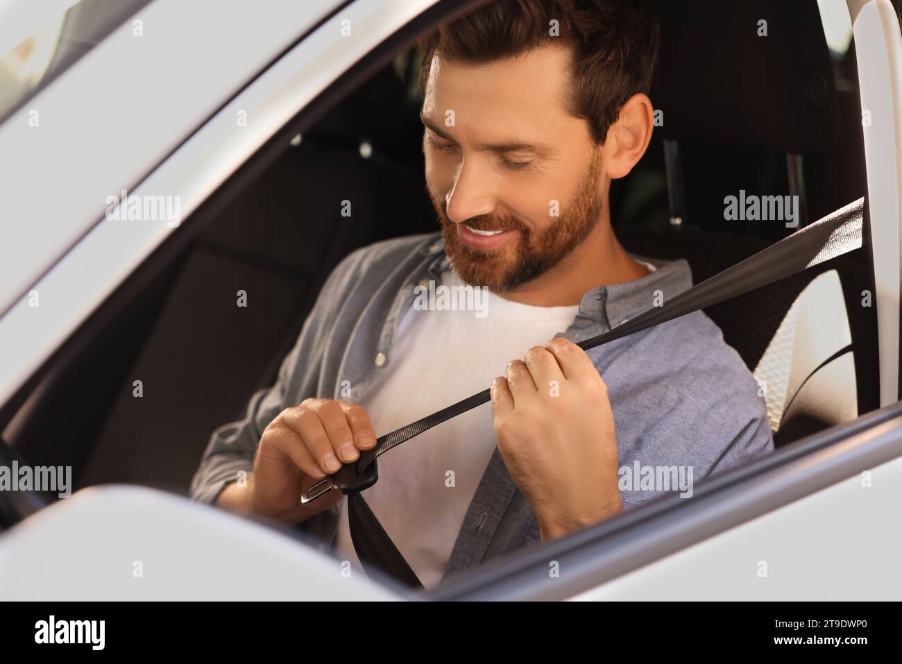 Pulling in the belt hi-res stock photography and images - Alamy