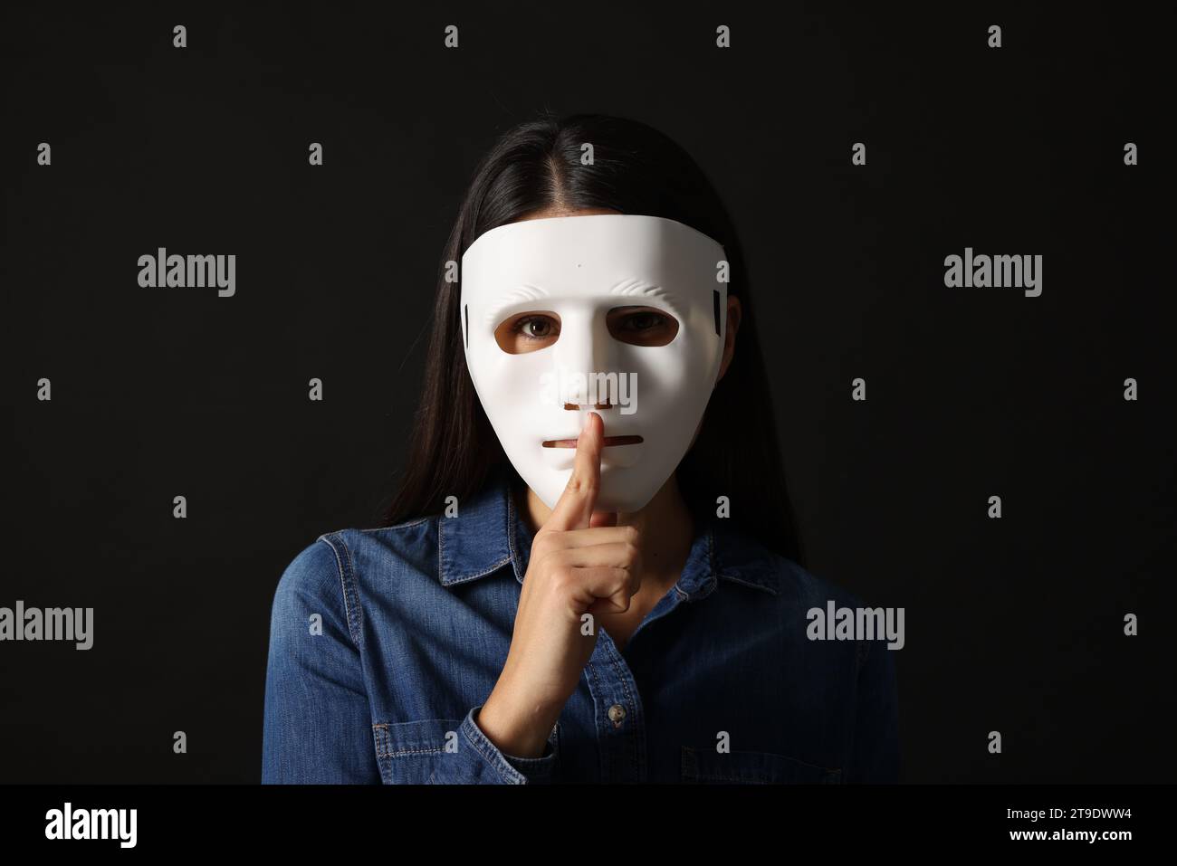 Multiple personality concept. Woman in mask on black background Stock ... Multiple personality concept. Woman in mask on black background Stock ...
