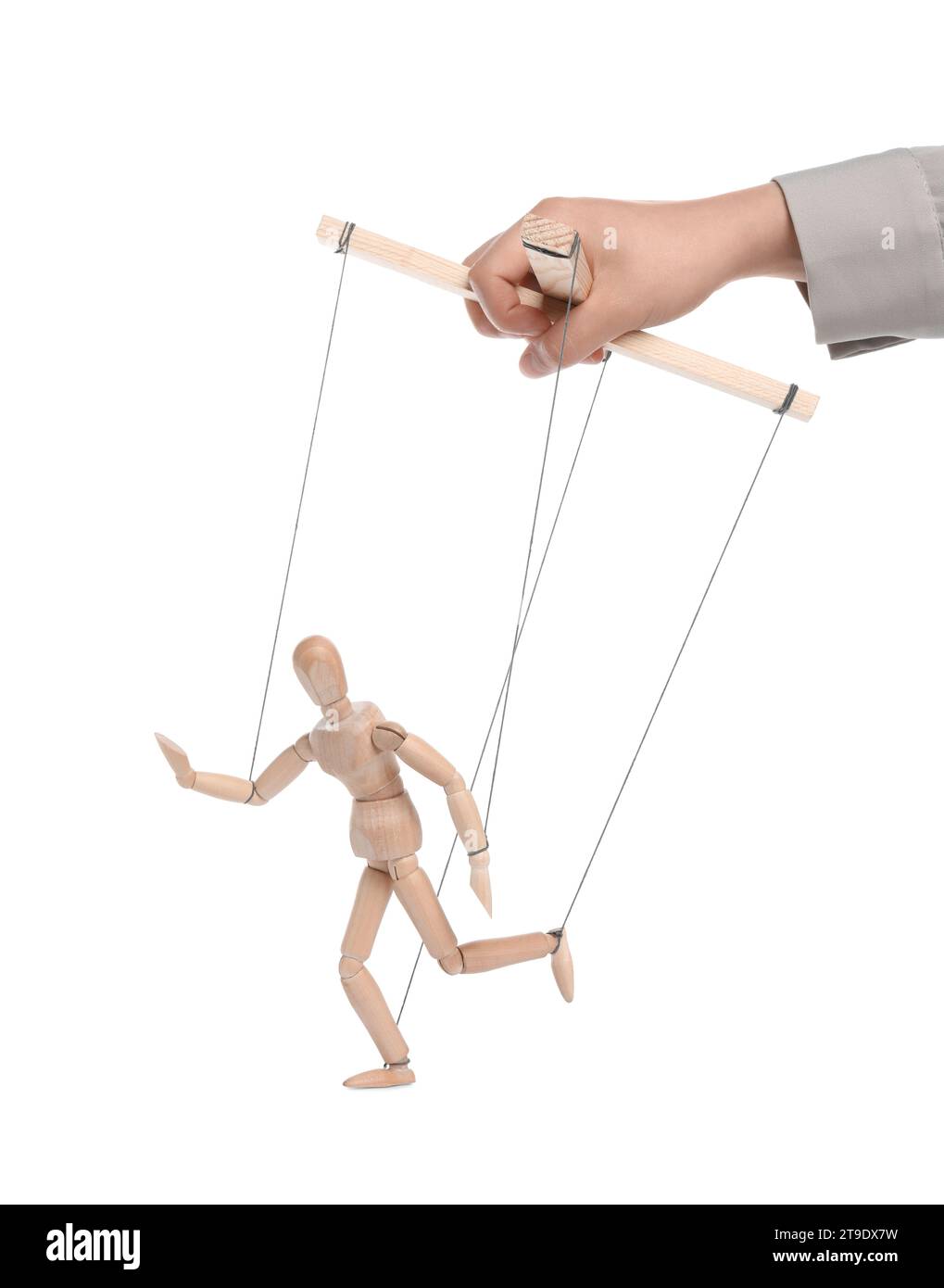 Woman pulling strings of puppet on white background, closeup Stock ...