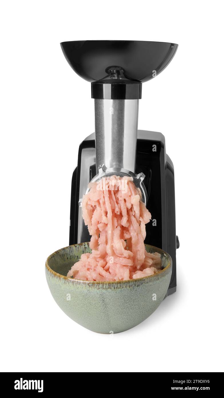 Electric meat grinder with chicken mince and bowl isolated on white ...