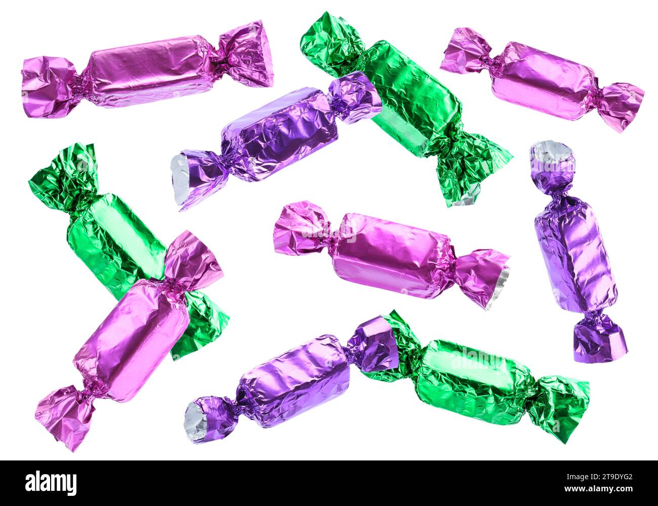 Tasty candies in bright wrappers falling on white background Stock ...