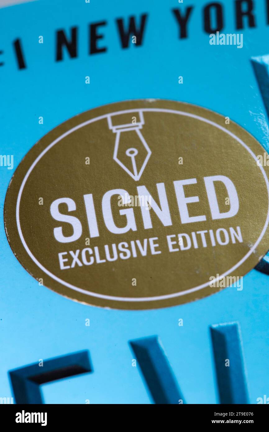 Close up of a "signed exclusive addition" sticker on the cover of a ...