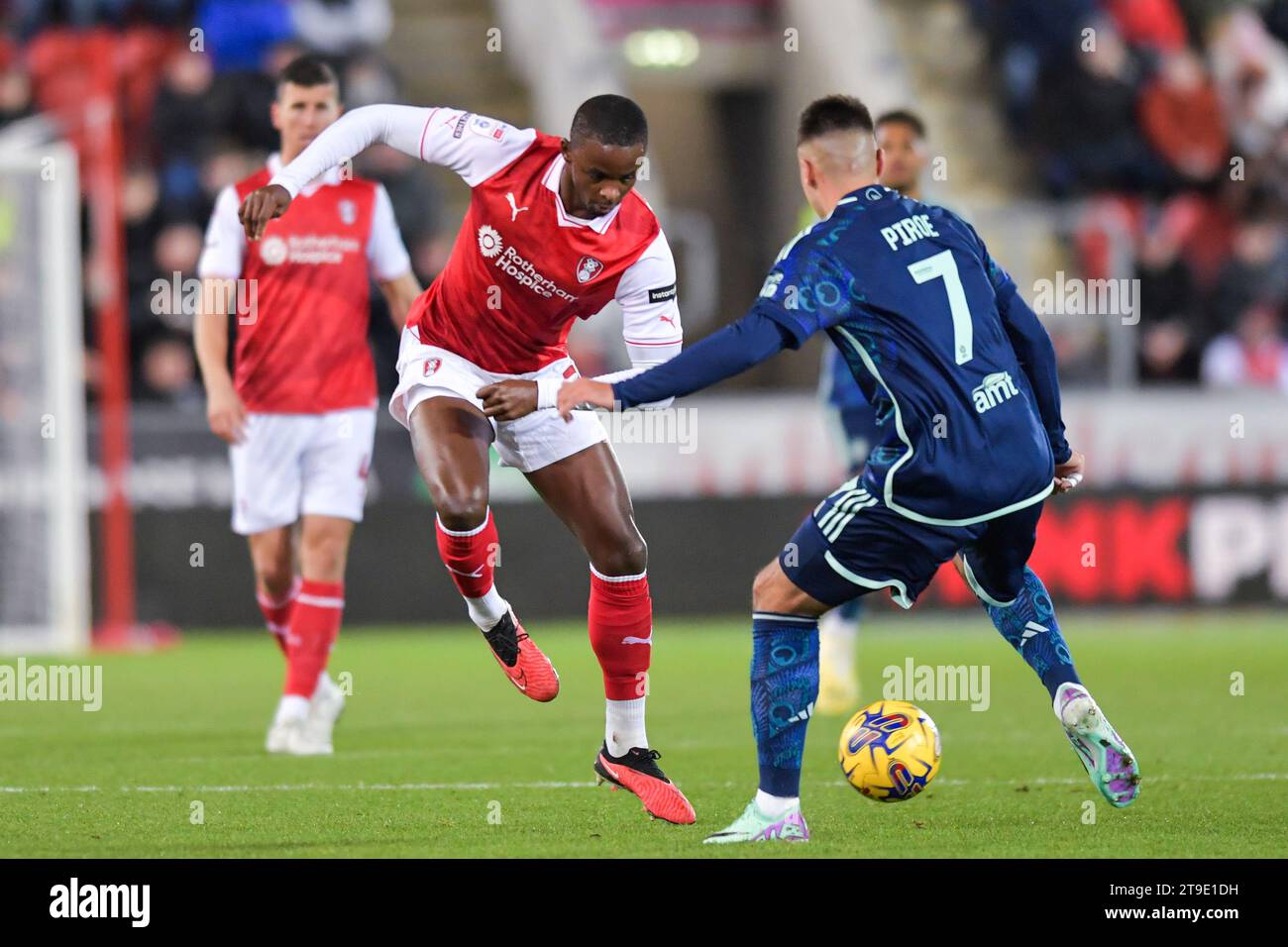 Rotherham United's Hakeem Odoffin slides the ball between Leeds United ...