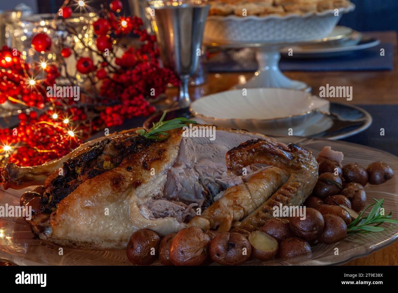 Roasted duck and stuffing on a holiday table with fine China Stock ...