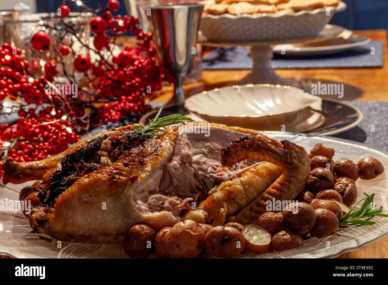 Roasted duck and stuffing on a holiday table with fine China Stock ...
