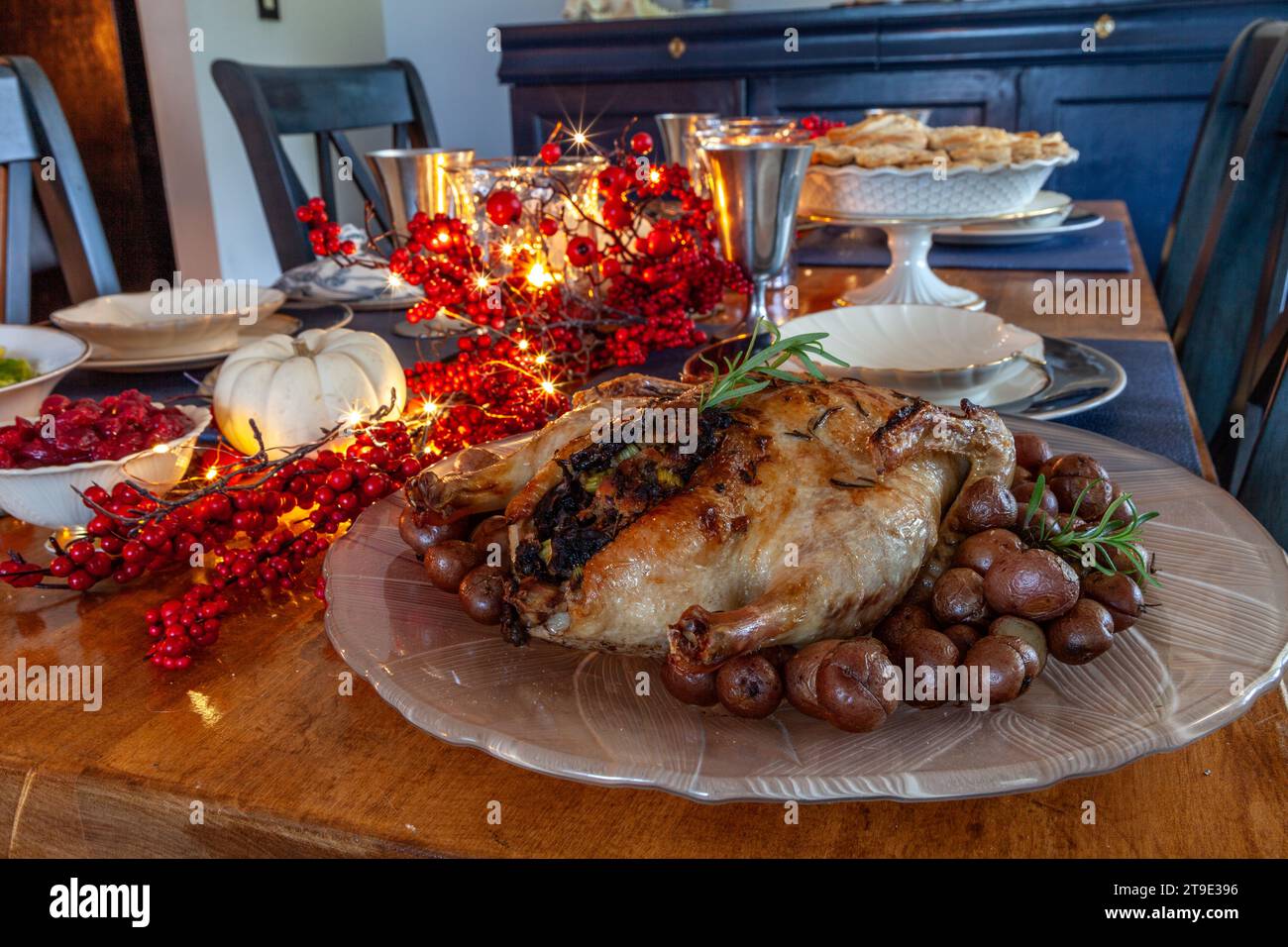 Roasted duck and stuffing on a holiday table with fine China Stock ...