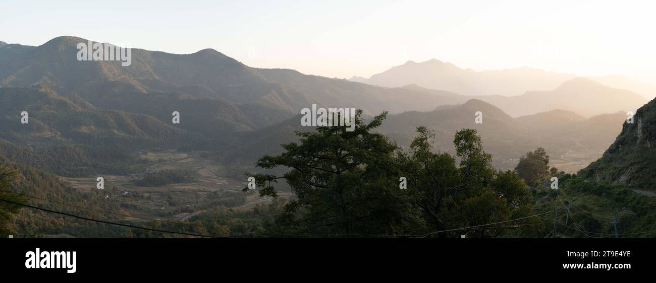 The beauty of the sunset over the rolling hills in the Himalaya ...