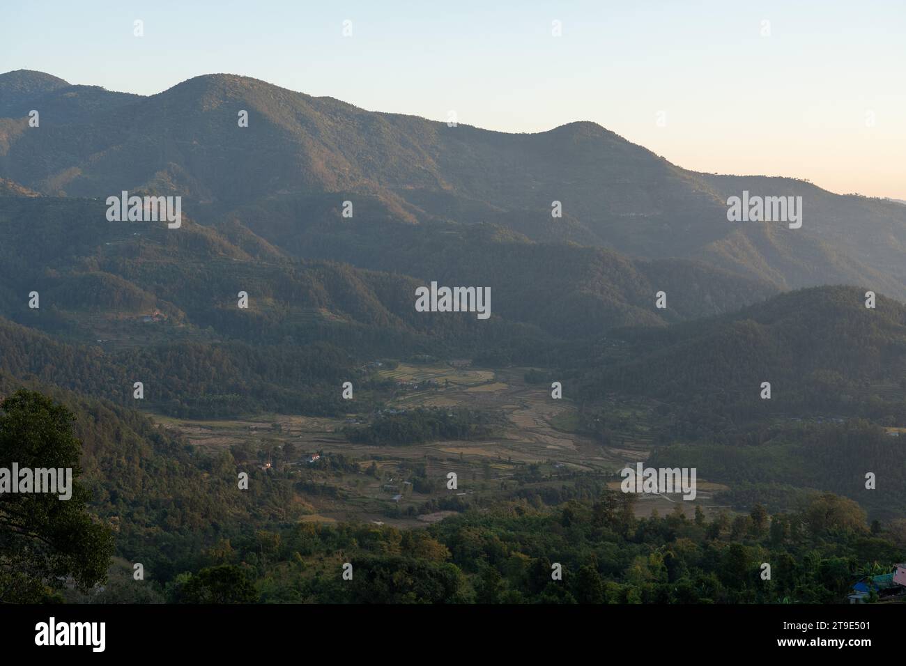 The beauty of the sunset over the rolling hills in the Himalaya ...