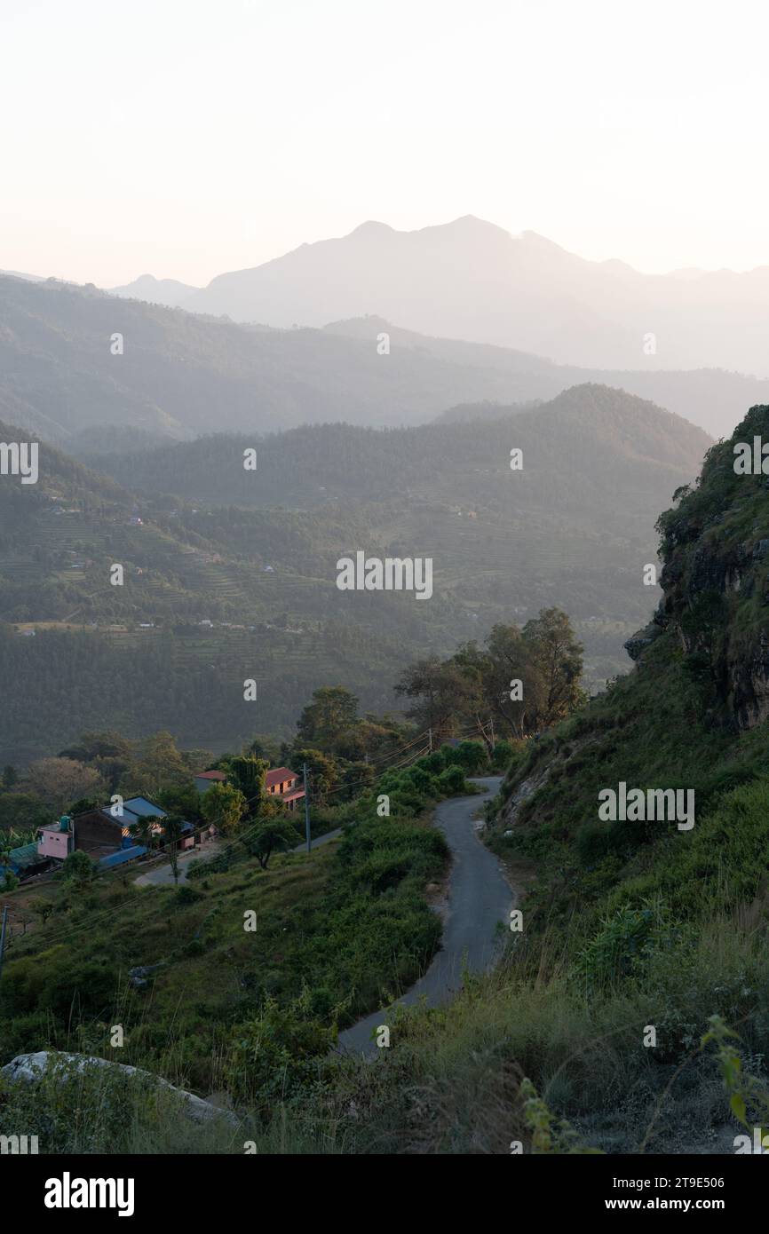 The beauty of the sunset over the rolling hills in the Himalaya ...