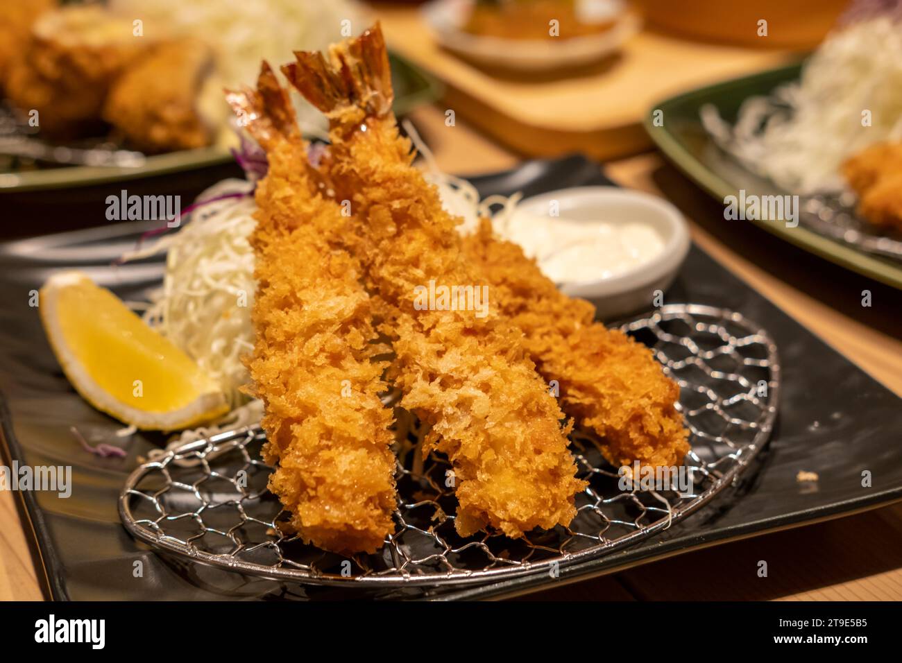 Fried shrimp served on plate in the restaurant Stock Photo - Alamy