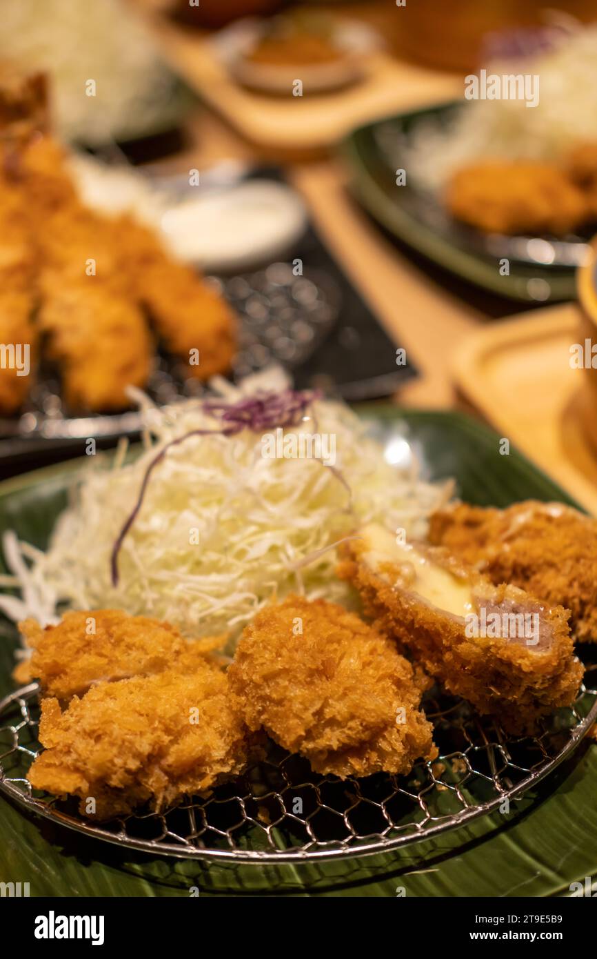 Cheese tonkatsu pork cutlet with rice and vegetable set, soft focus ...