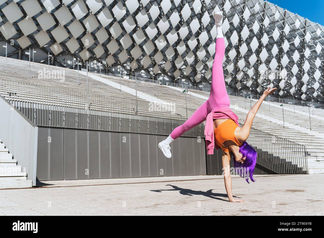 Woman cartwheel hi-res stock photography and images - Alamy