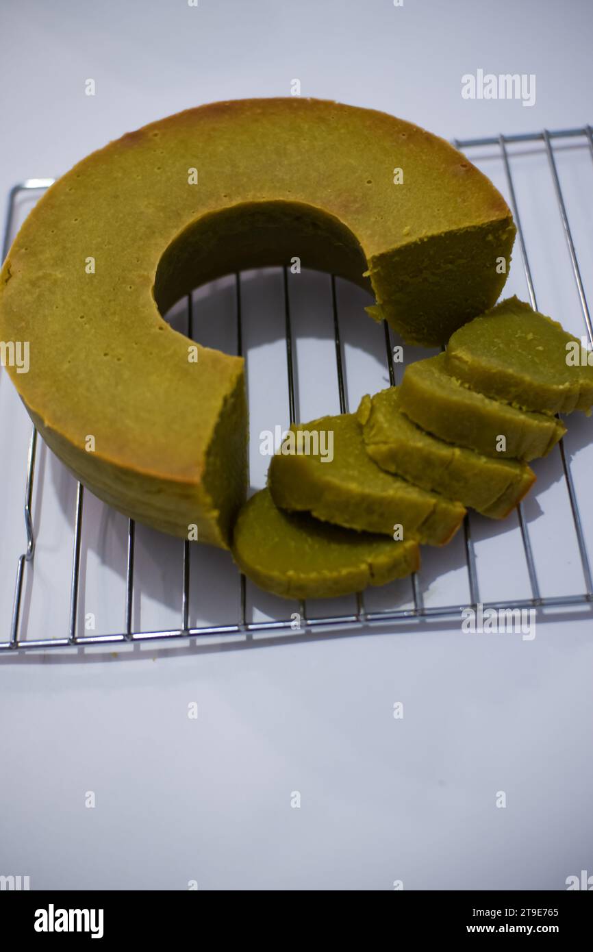 Homemade green bean sponge cake that has been cut to serve Stock Photo ...