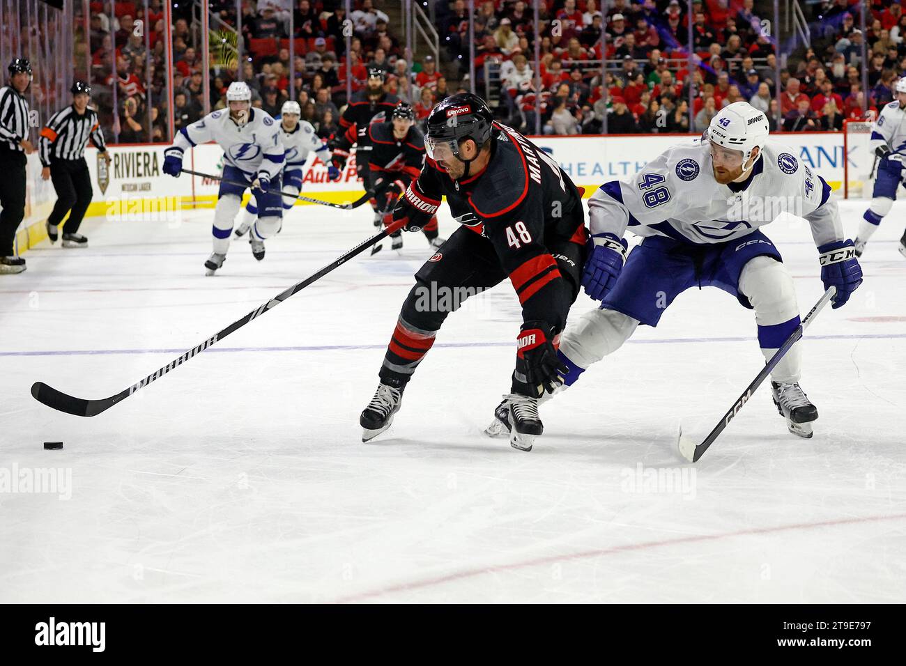 Carolina Hurricanes' Jordan Martinook (48) tries to control the puck ...