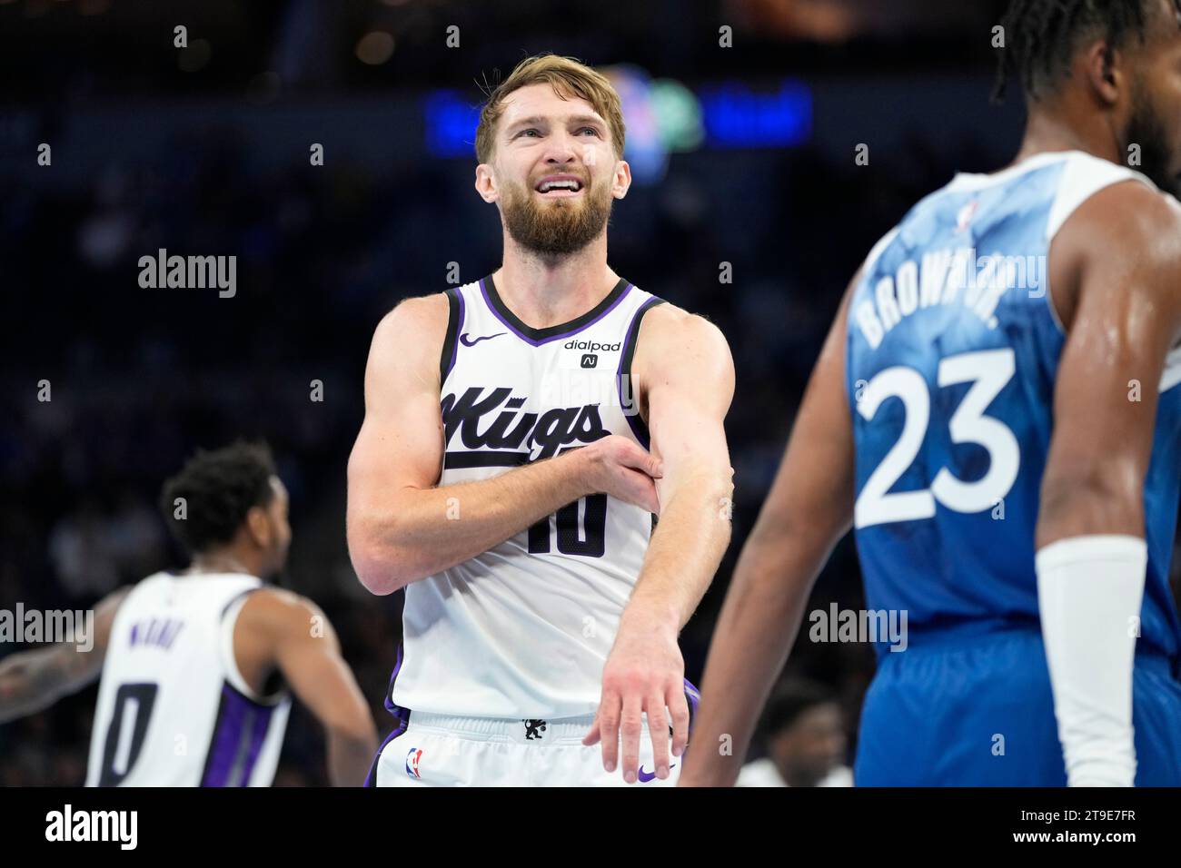 Sacramento Kings forward Domantas Sabonis (10) grabs his arm during the second half of an NBA ...