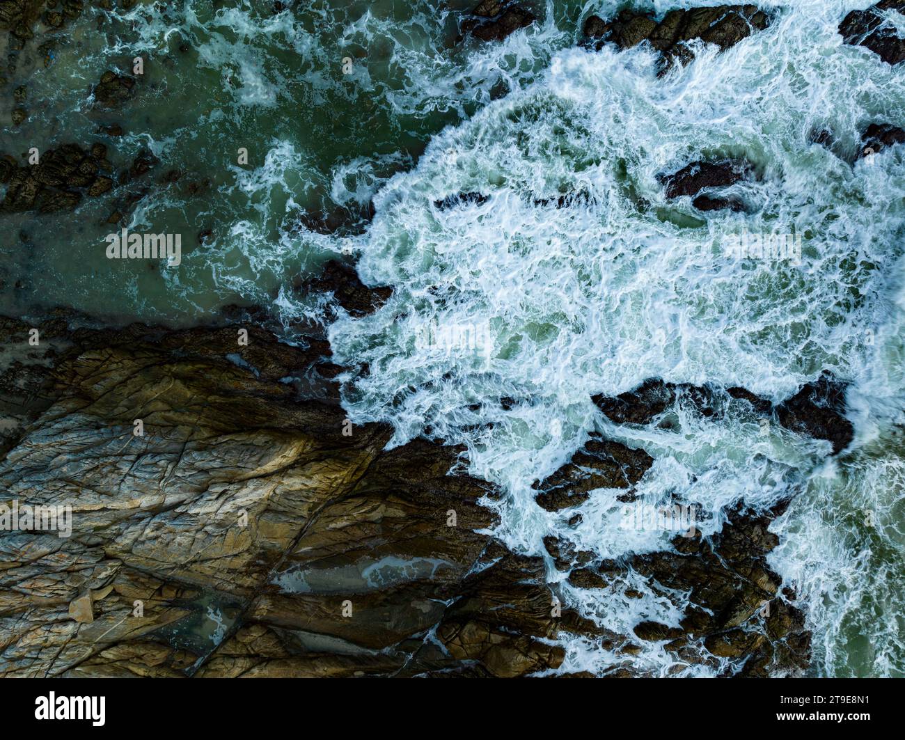 Bird eye view seashore with big wave crashing on rock cliff. Beautiful ...