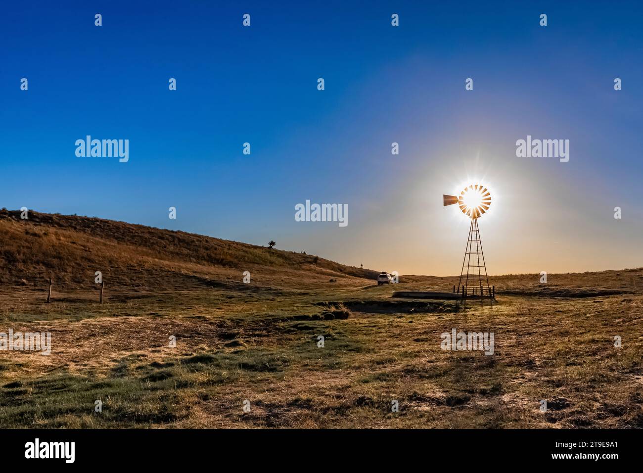 Windmill pumping water for cattle on the range in Nebraska National ...