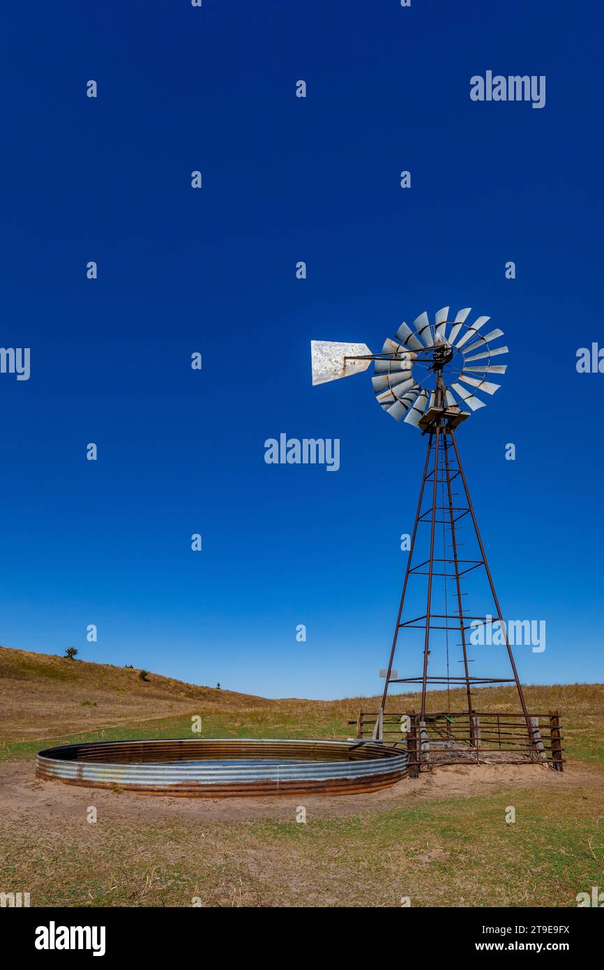 Windmill pumping water for cattle on the range in Nebraska National ...
