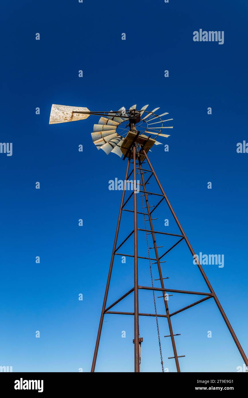Windmill pumping water for cattle on the range in Nebraska National ...