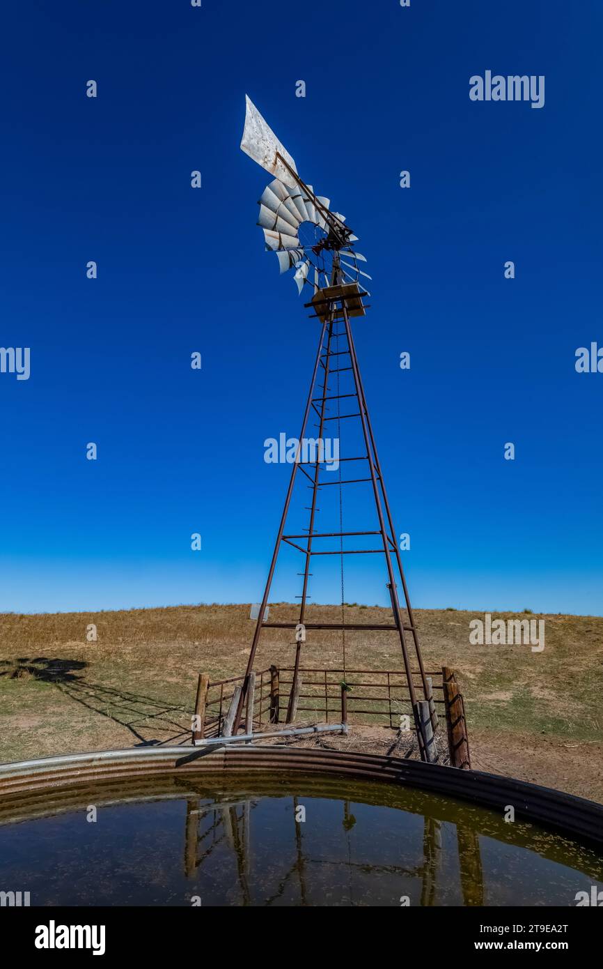 Windmill pumping water for cattle on the range in Nebraska National ...