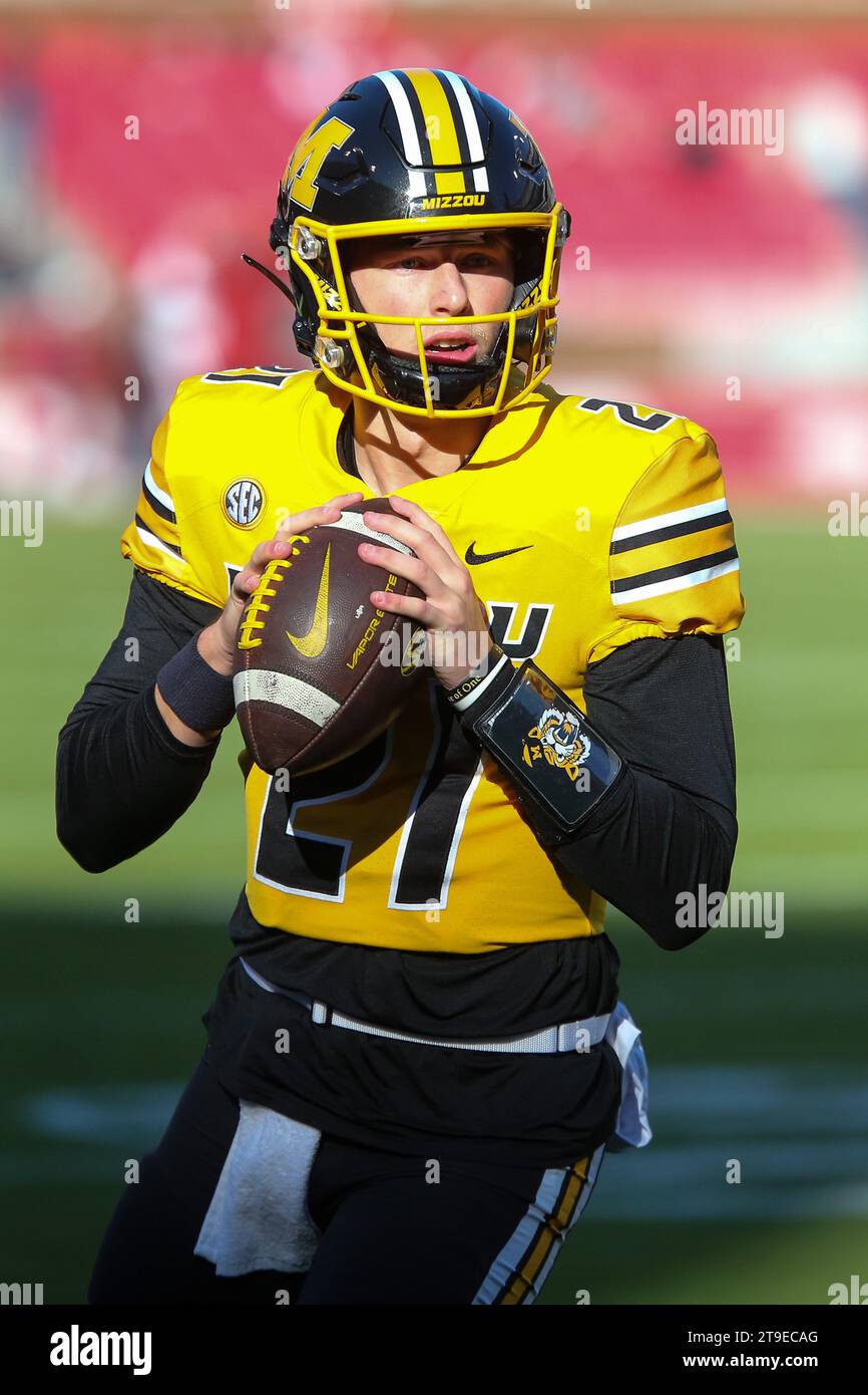 November 24, 2023: Tigers QB Sam Horn #21 sets up with the ball ...