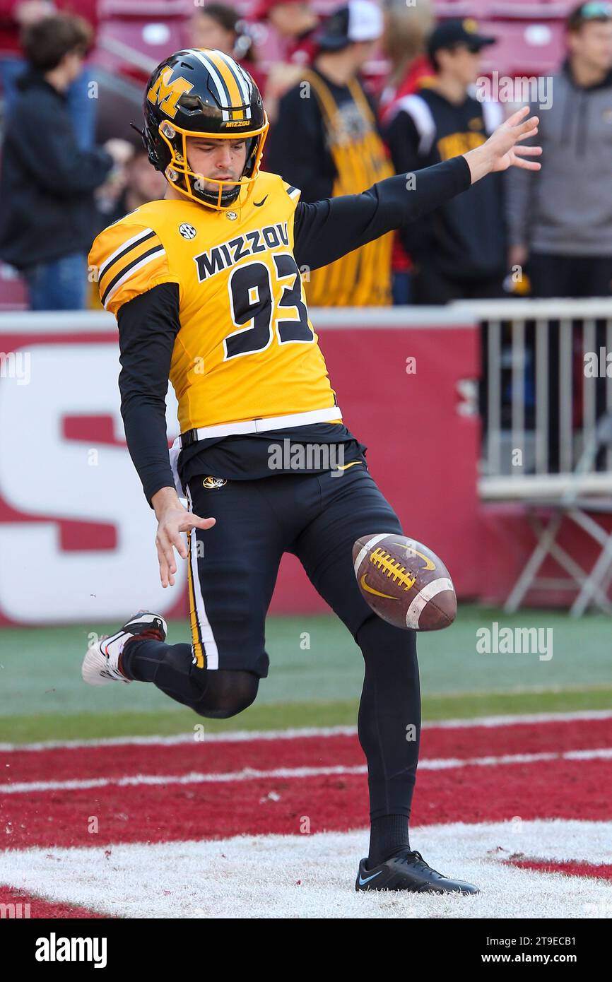 November 24, 2023: Missouri punter Luke Bauer #93 drops the ball onto ...