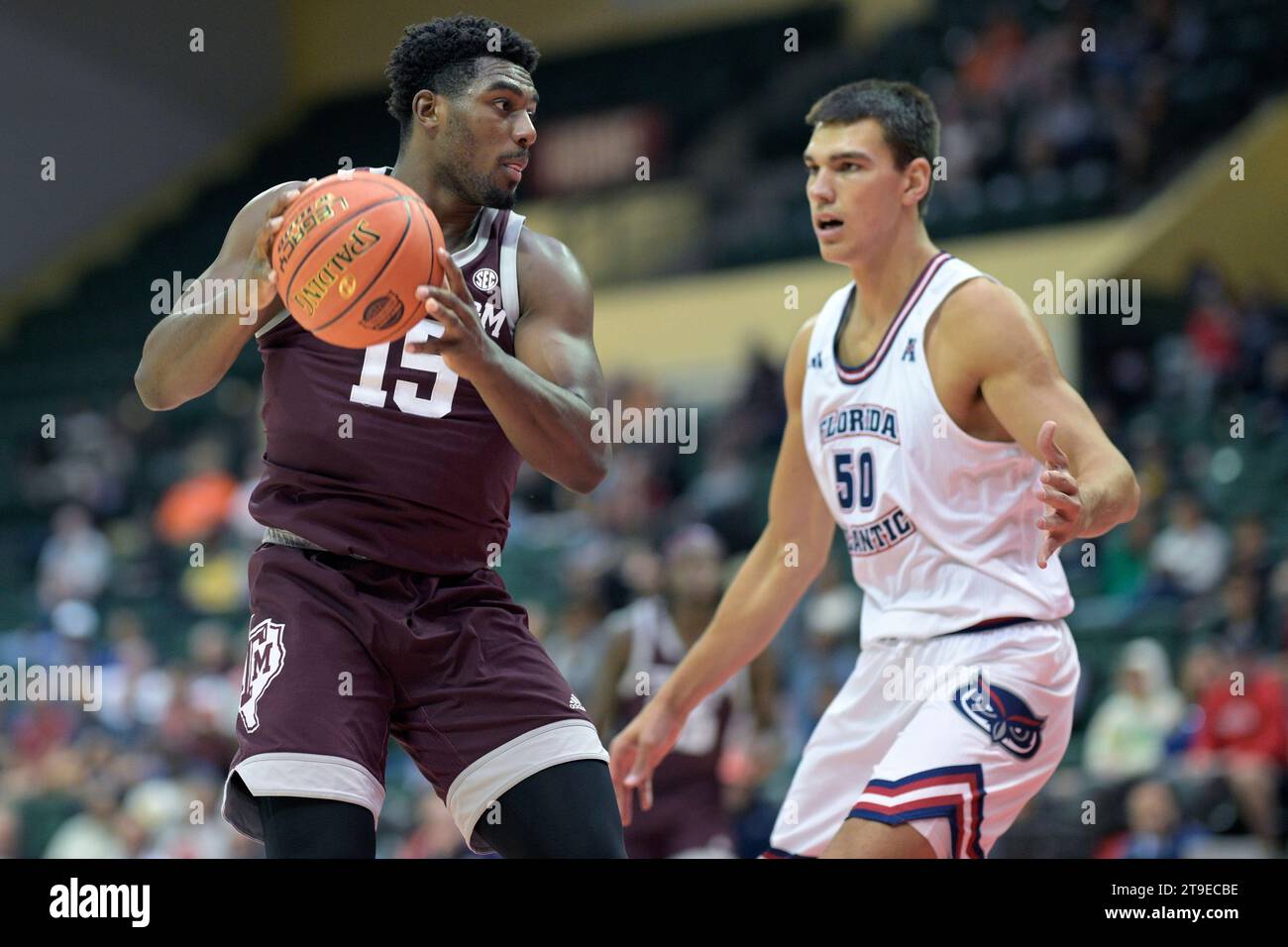Texas A&M forward Henry Coleman III (15) is defended by Florida ...