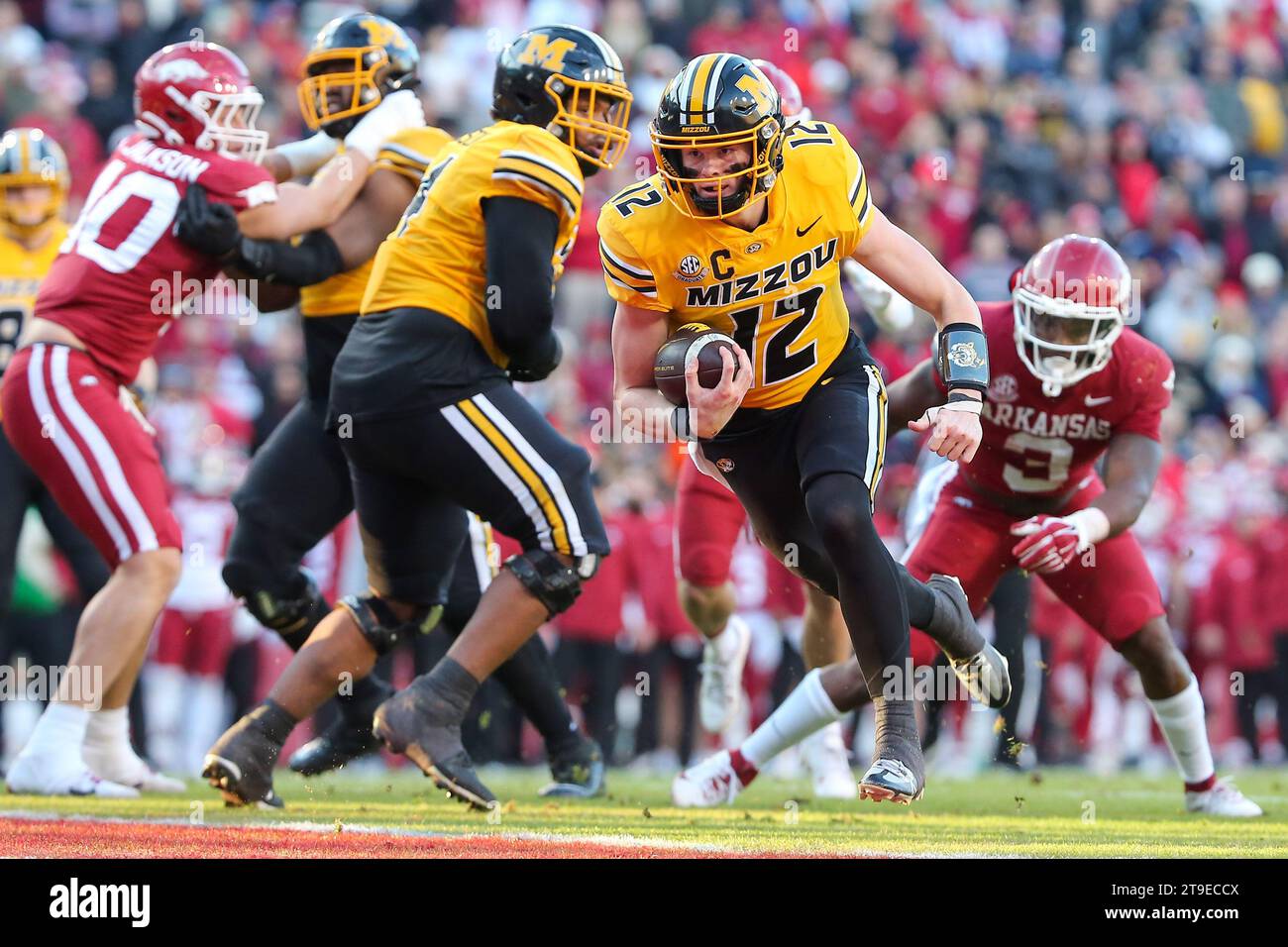 November 24, 2023: Brady Cook #12 Missouri QB looks for the end zone as ...