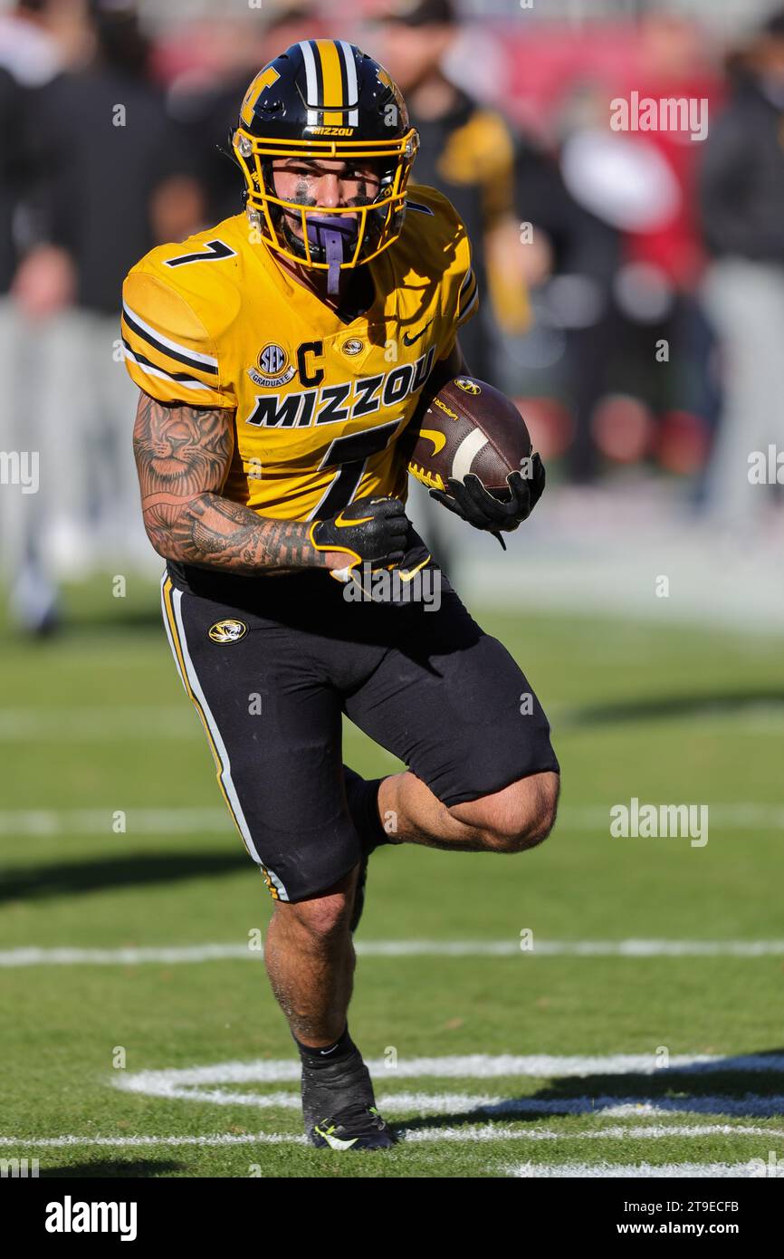 November 24, 2023: Cody Schrader #7 Tigers running back brings the ball ...