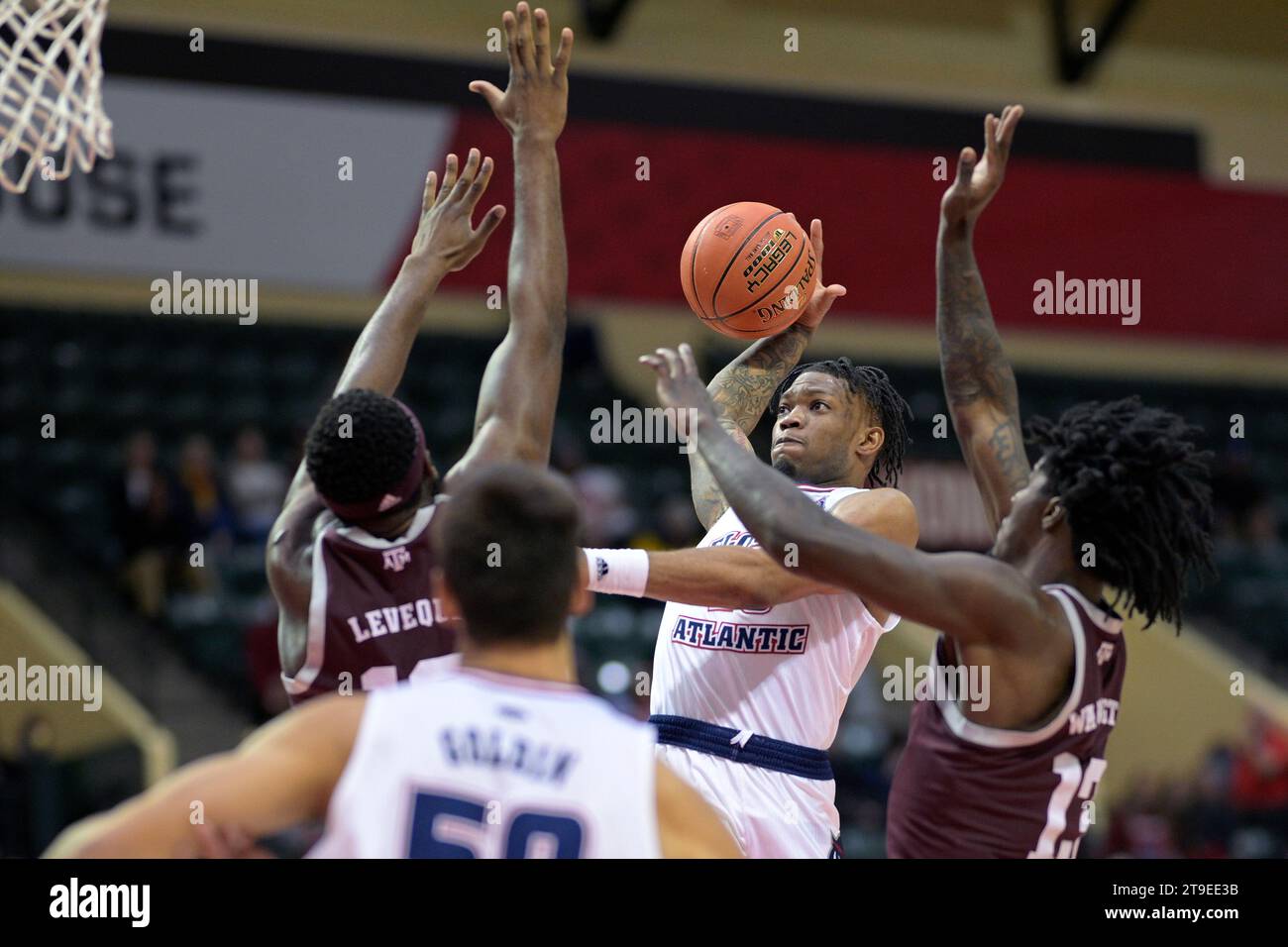 Florida Atlantic guard Alijah Martin attempts a dunk between Texas A&M ...