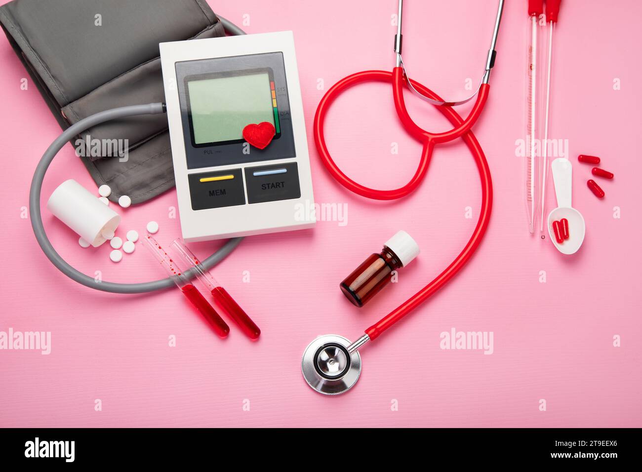 Stethoscope, medicine, tubs on pink background. Medical stuff. Top view ...