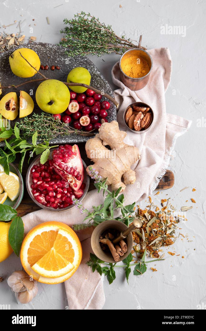 Variety of immunity boosting foods. Flat-lay of ginger, turmeric ...