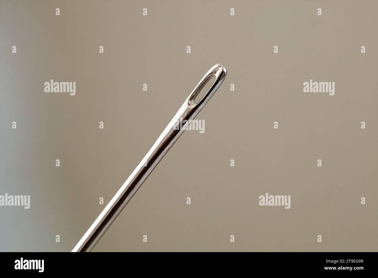 Sewing needle tailor, eyelet hole close-up macro view Stock Photo - Alamy