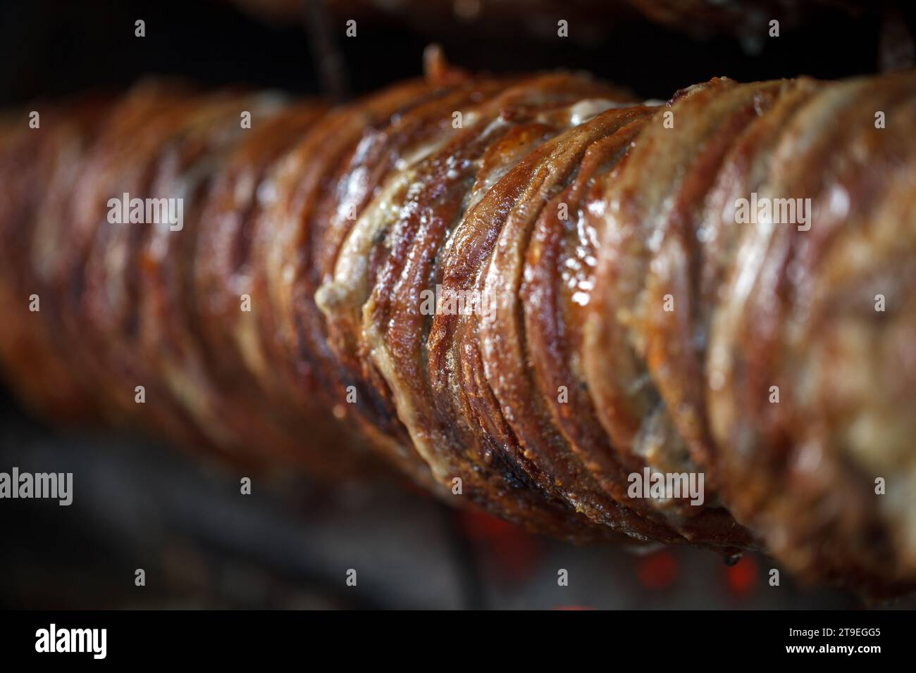 Kokorech, lamb intestines and giblets are cooked on spit, bokeh ...