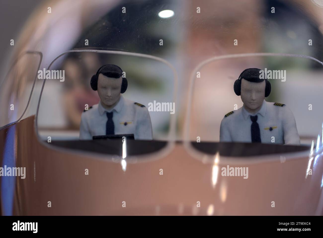 Airplane cockpit model with pilots front view Stock Photo - Alamy