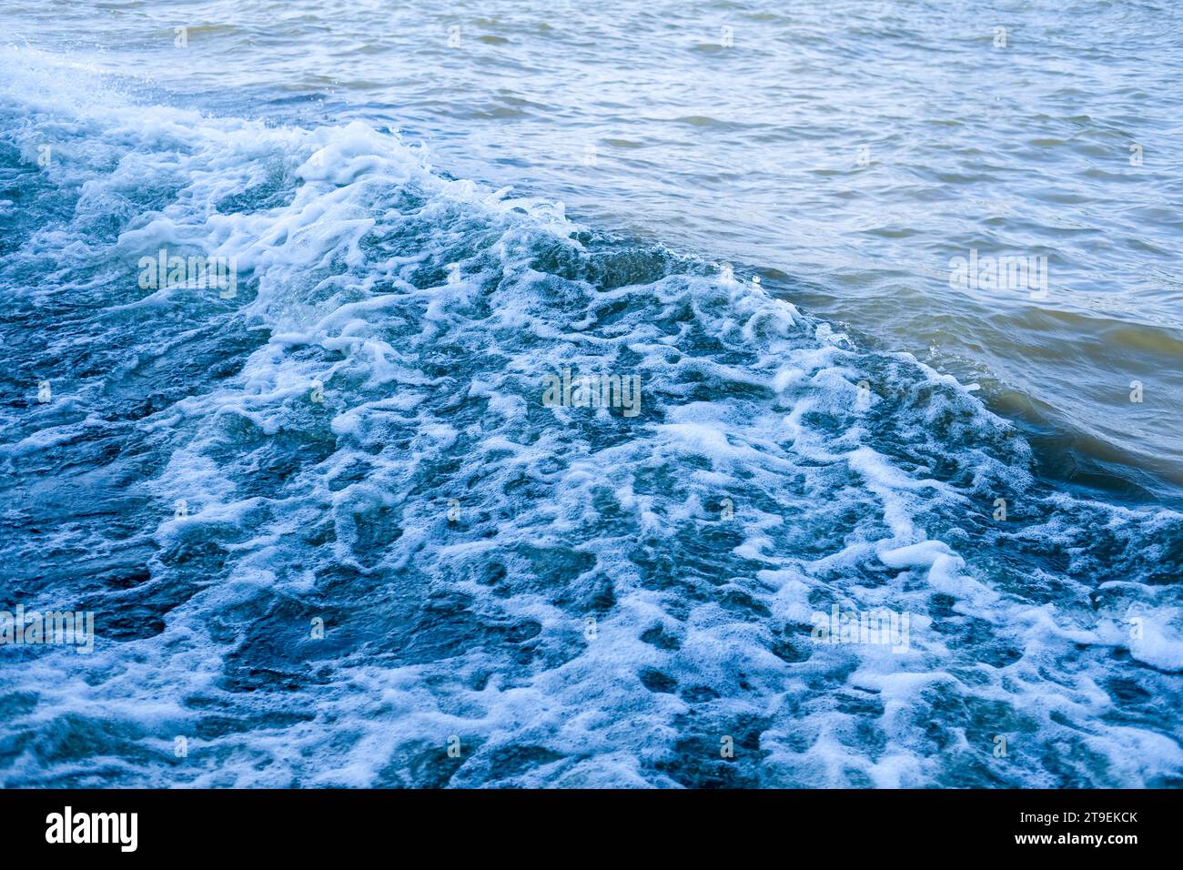 Blue wave water surface background Stock Photo - Alamy
