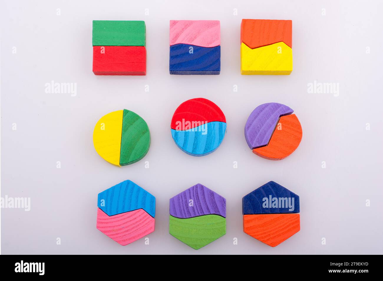 Colorful wooden pieces of a logic puzzle Stock Photo - Alamy